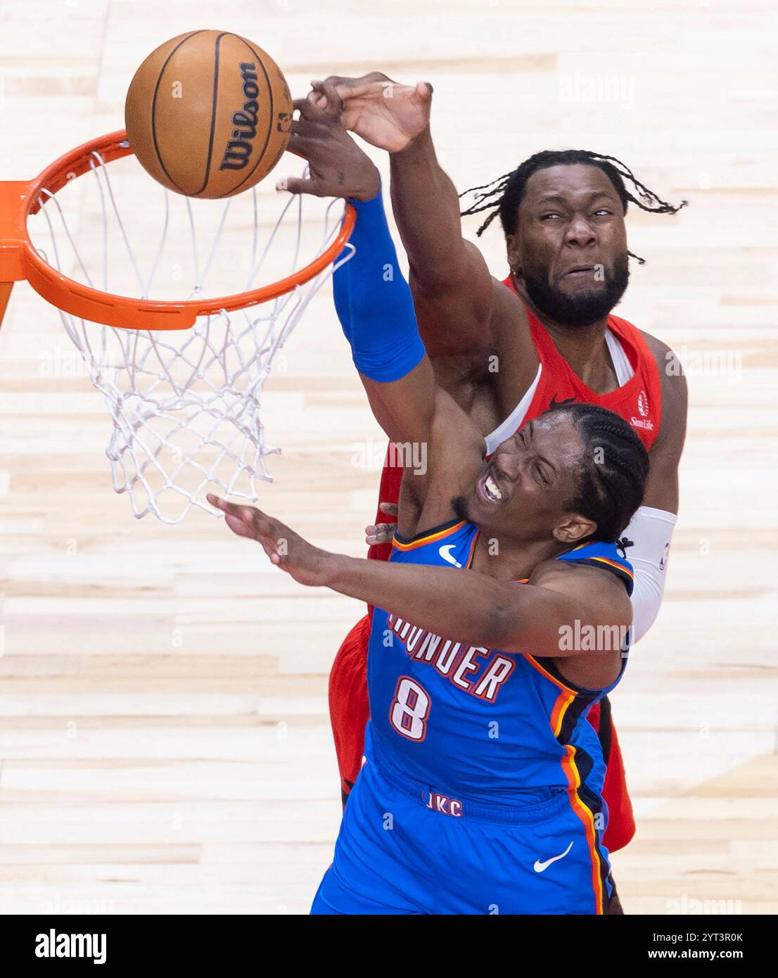 Toronto, Canada. 5th Dec, 2024. Jalen Williams (front) of Oklahoma City ...