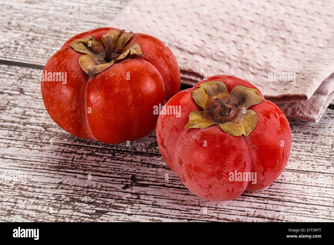 Sweet and tasty fresh ripe persimmon fruit Stock Photo - Alamy