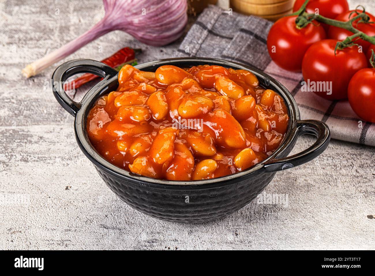Baked white kidney bean with tomato sauce Stock Photo - Alamy
