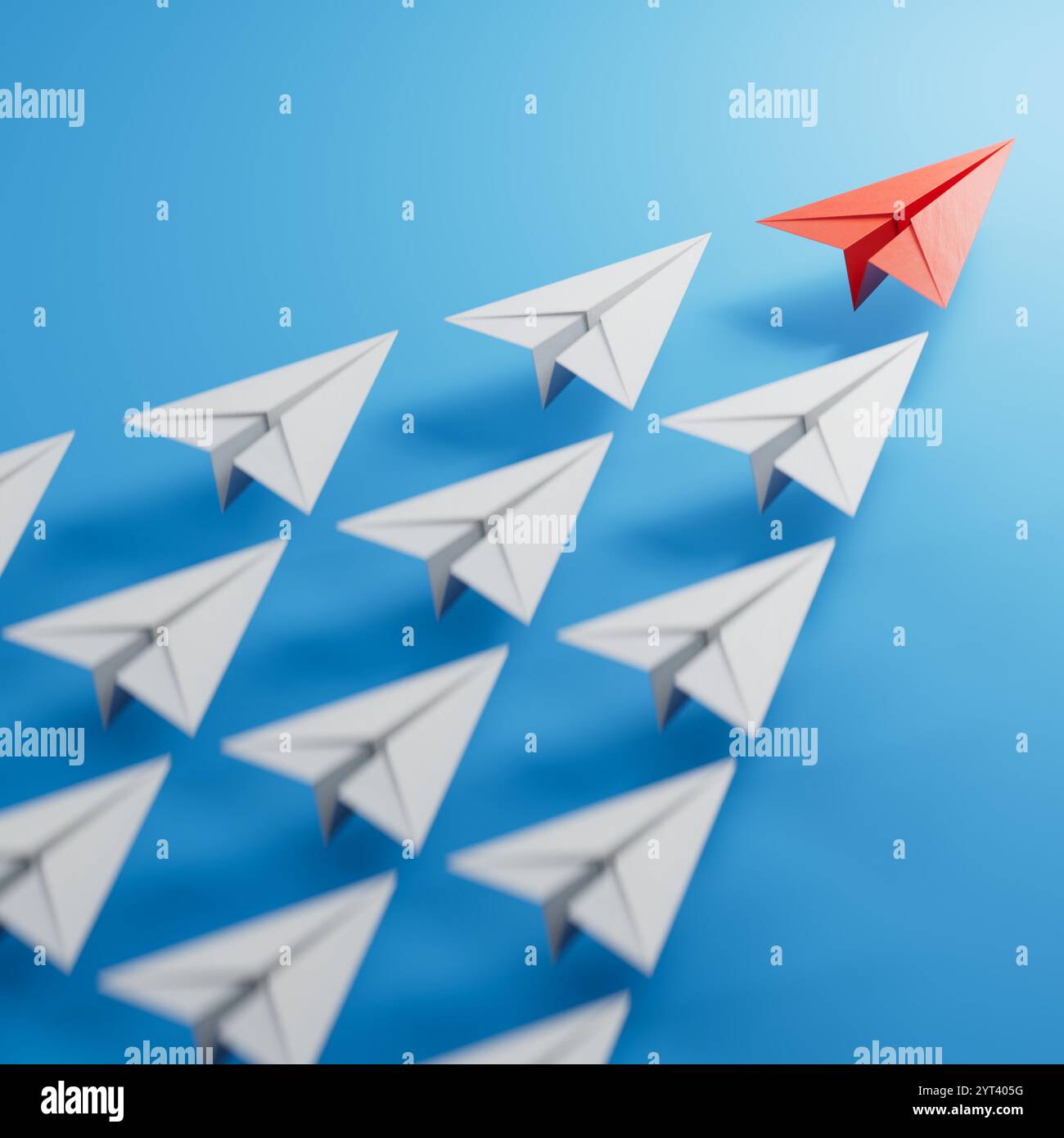 group of paper planes on a white background. concept of a strong leader ...