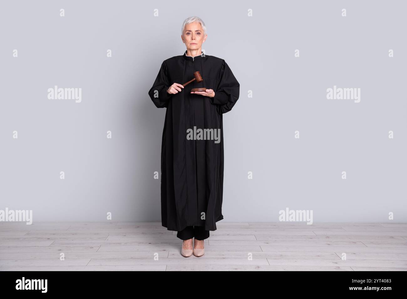 Photo of serious government judge woman hit gavel for verdict isolated ...