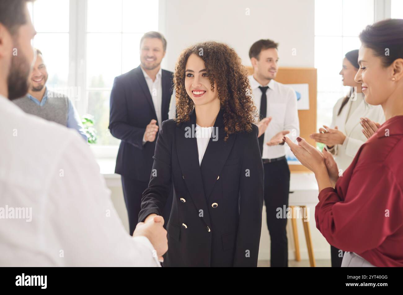 Smiling young hr employer after interviewing, happy new job applicant ...