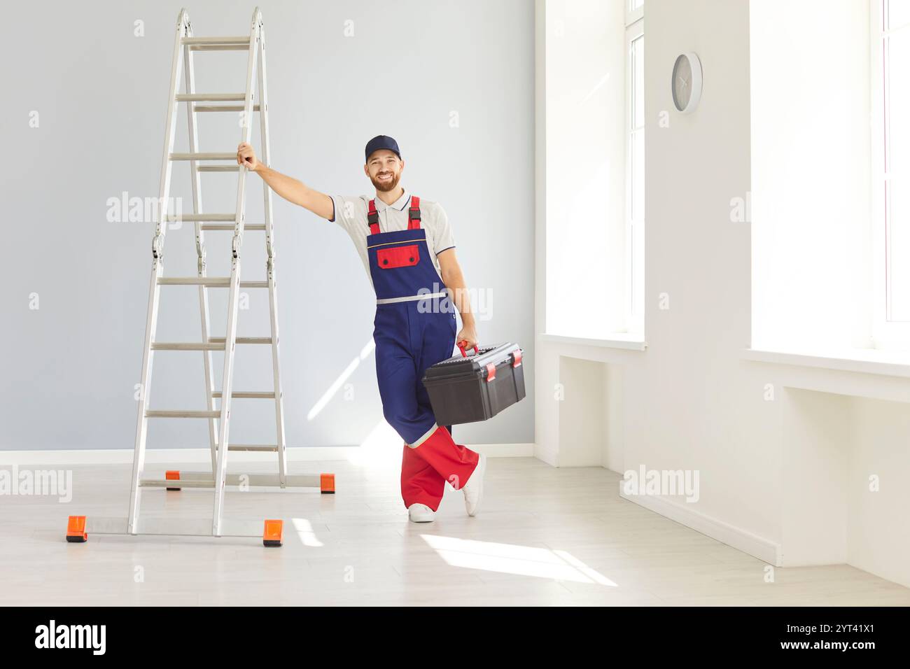 Happy Worker with Ladder and Tools Portrait During Home Renovation ...