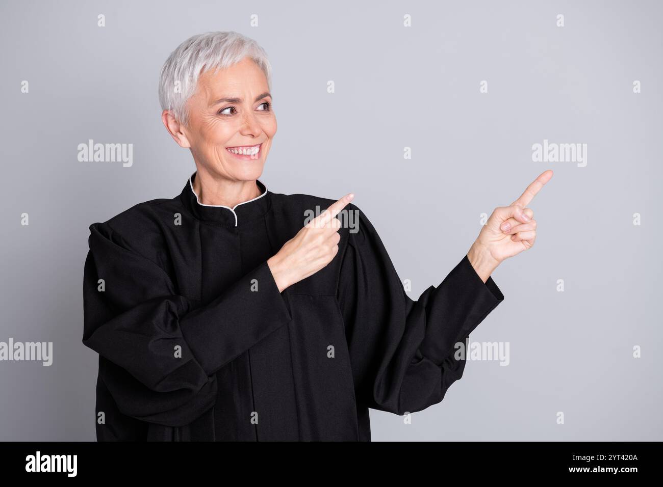 Photo of lady judge point finger empty space show verdict isolated grey ...