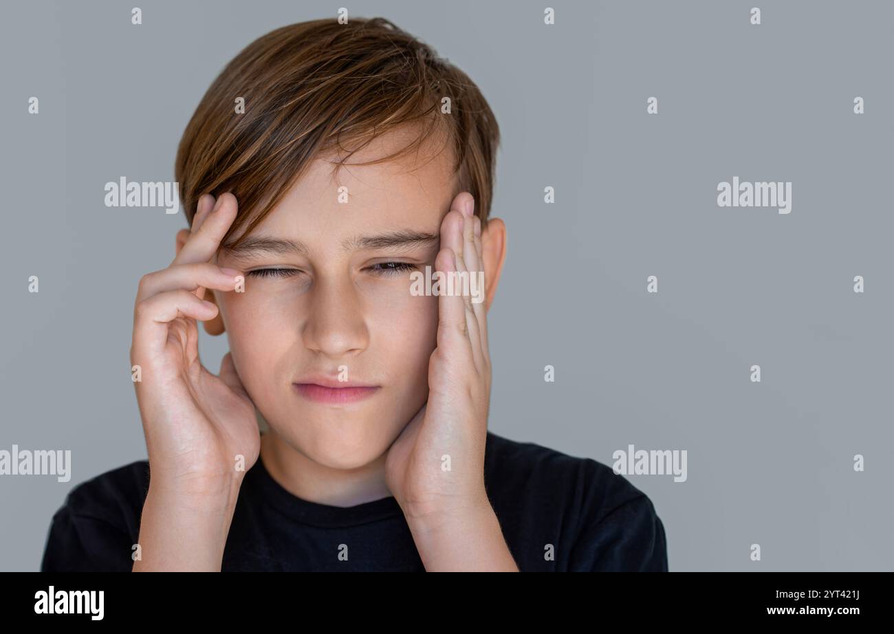 Little boy having a headache, pain. Headache child. Suffering migraine ...