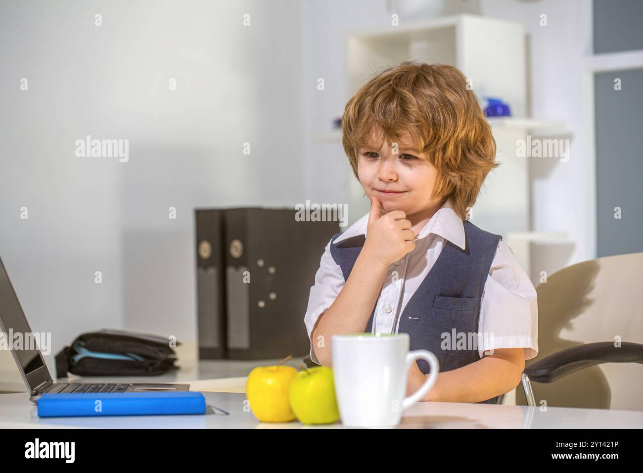 Child handsome boy in office. Seriously little children business man ...