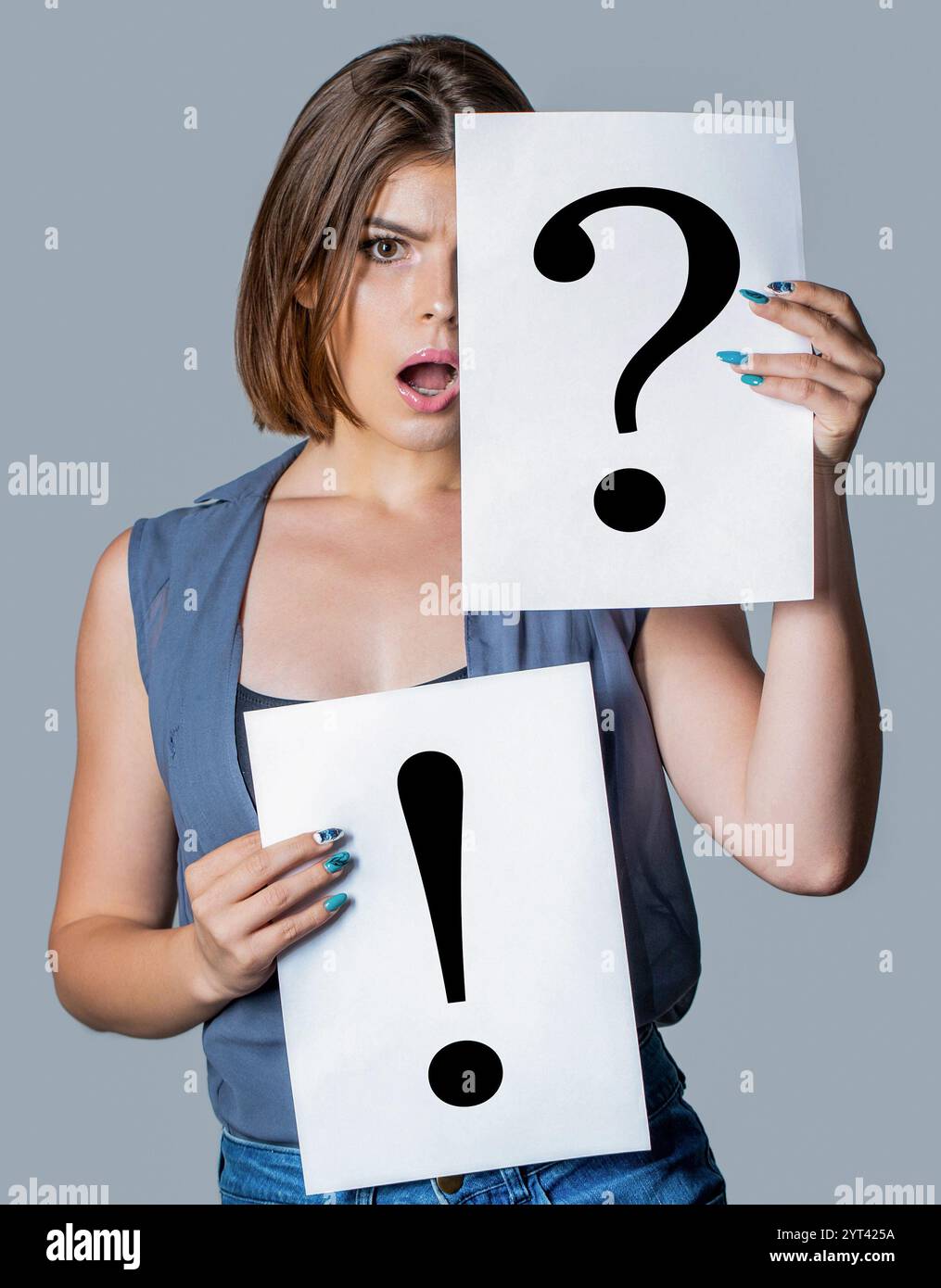 Concept of question, exclamation marks. Girl with a question and ...