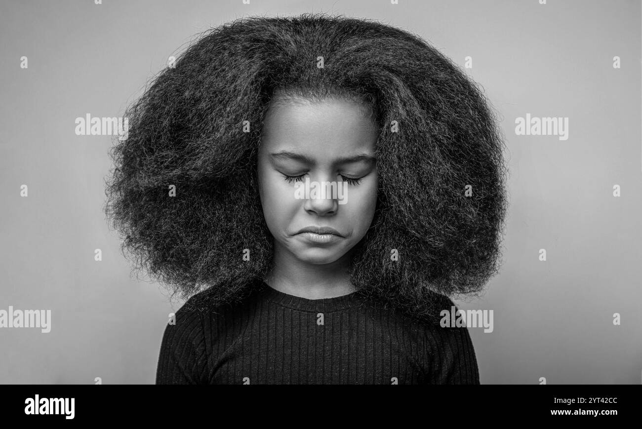 Little unhappy afro girl. Alone and scared, sad depressed children crying. Black and white Stock ...