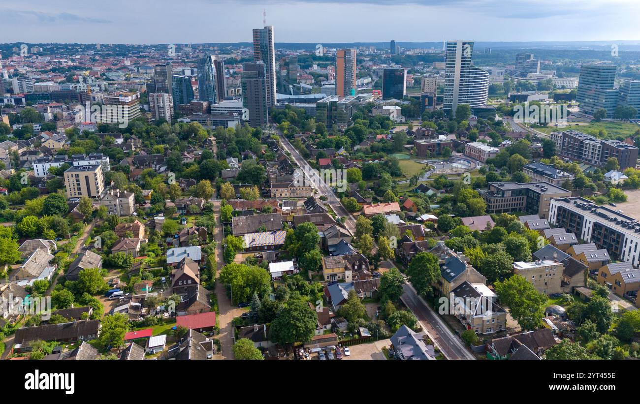Aerial view of a cityscape with a mix of modern skyscrapers and ...