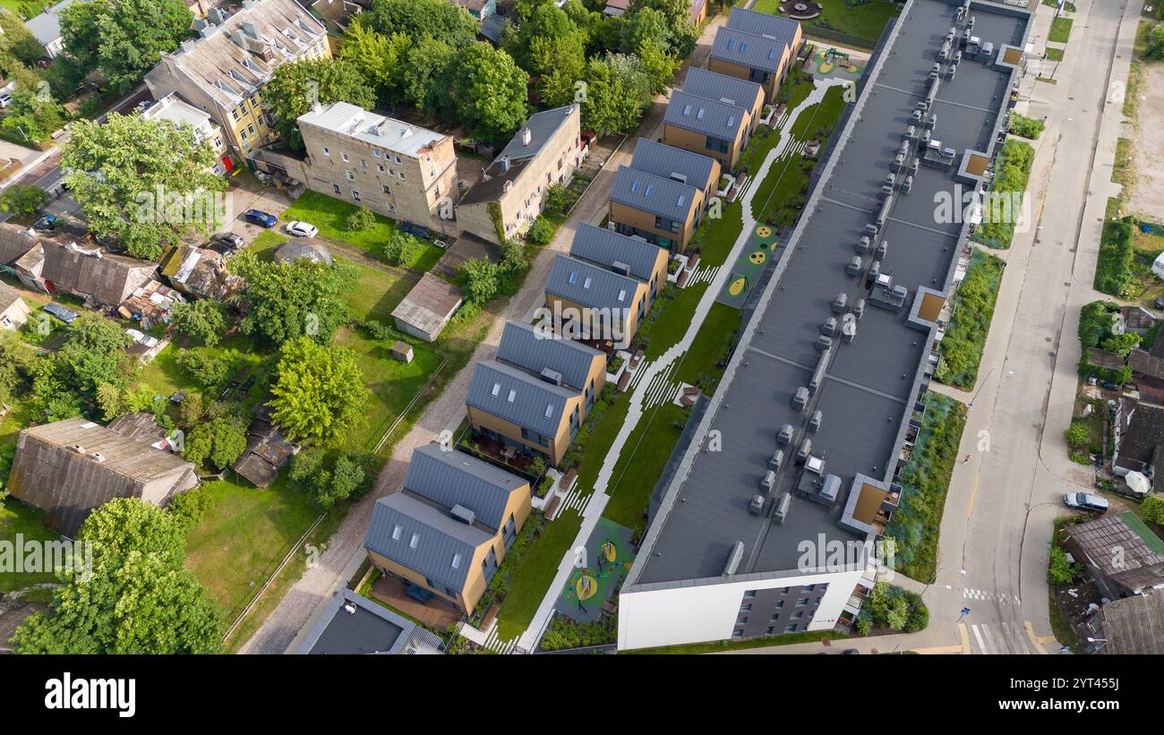 Aerial view of a modern residential complex with multiple buildings ...