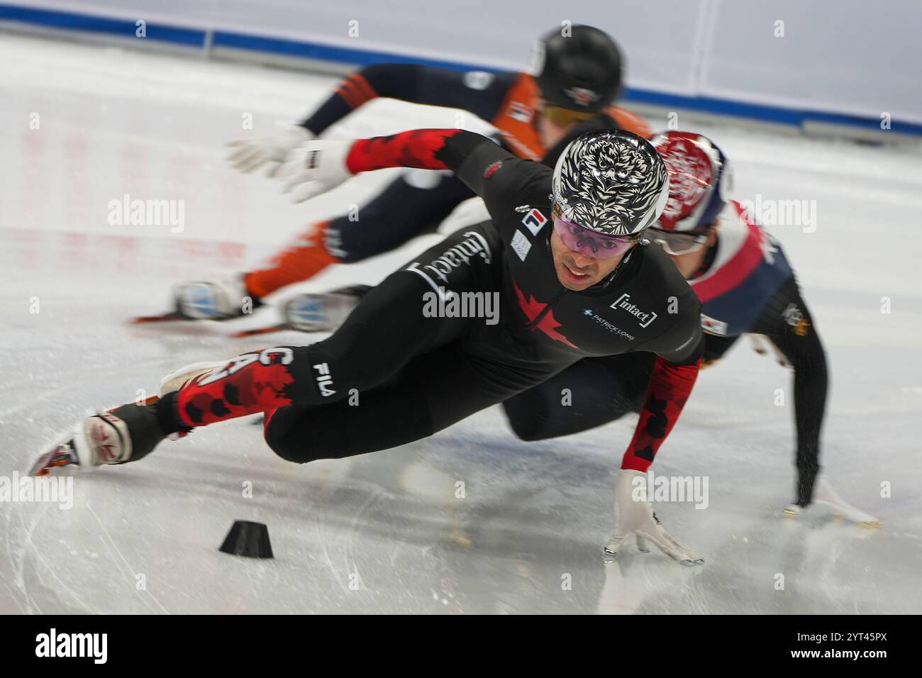 William Dandjinou of Canada leads as he competes in the heats of the ...