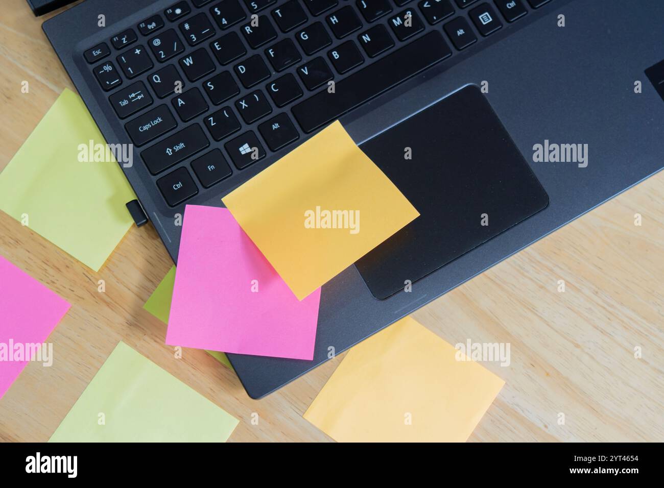 Empty sticky post note paper sheets on laptop keyboard. note list ...