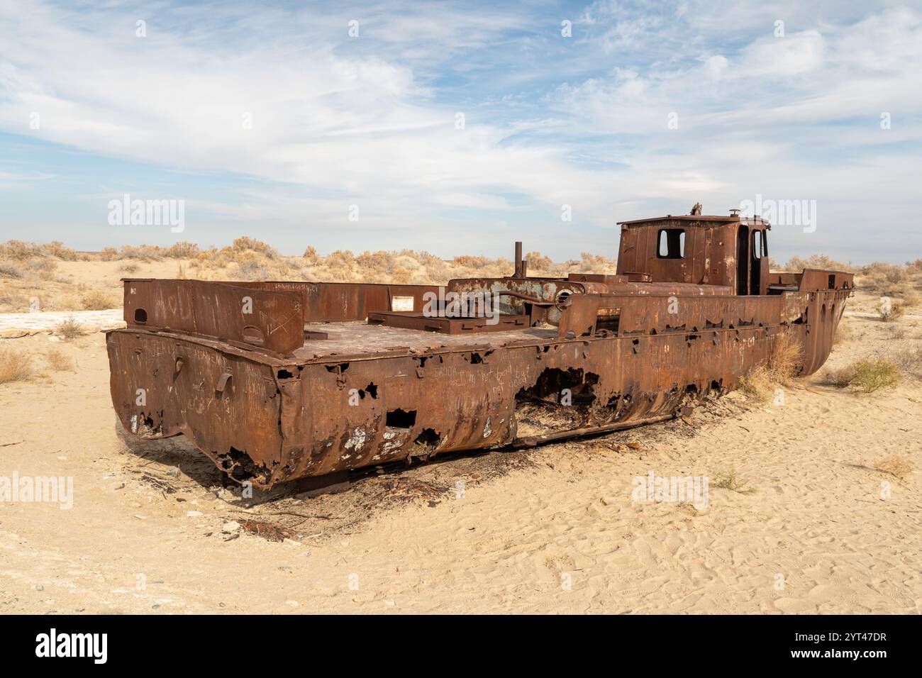 shipwreck. Ecological disaster of the Aral Sea. Rusty ships at the ship ...