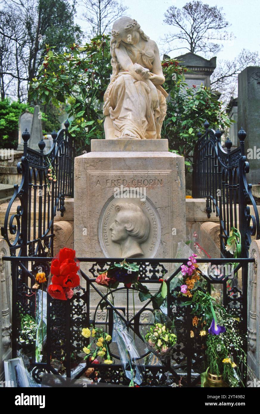 Polish composer, pianist Fryderyk Chopin tombstone, with statue of muse ...