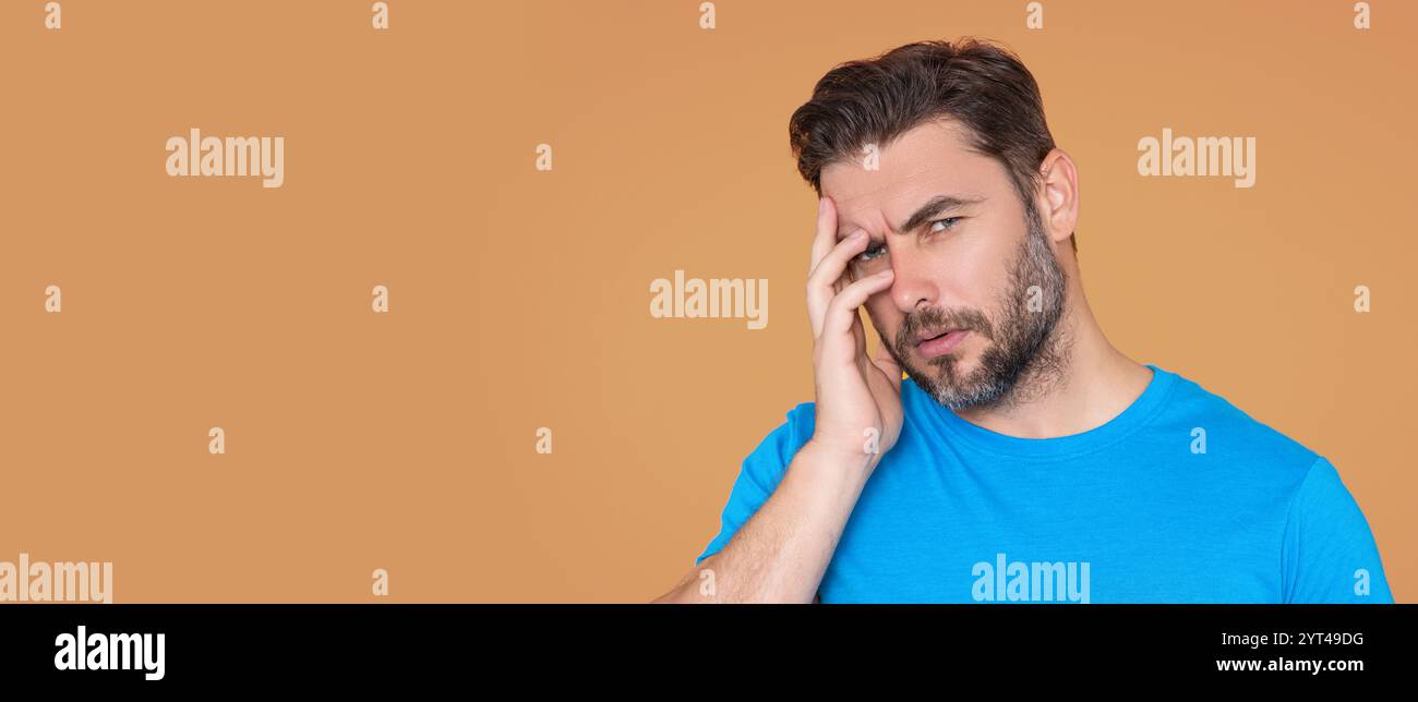 Stressed lonely man holding his head, feeling anxious. Man experiencing ...