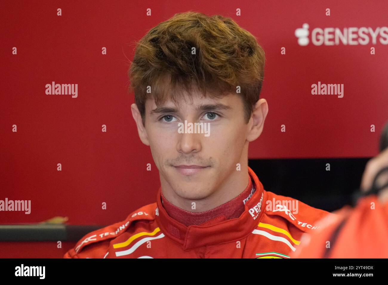 Ferrari driver Arthur Leclerc of Monaco stands in the garage before his ...