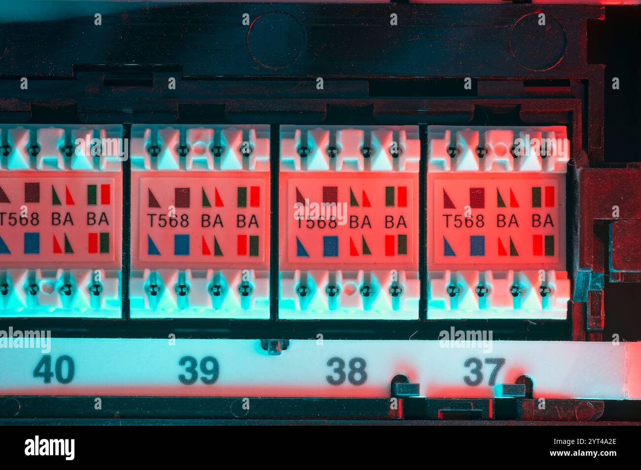 Rear of network patch panel with blue and red tint Stock Photo - Alamy