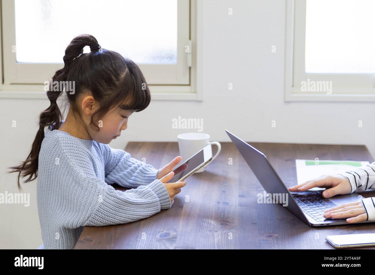 Child playing with computer table hi-res stock photography and images ...