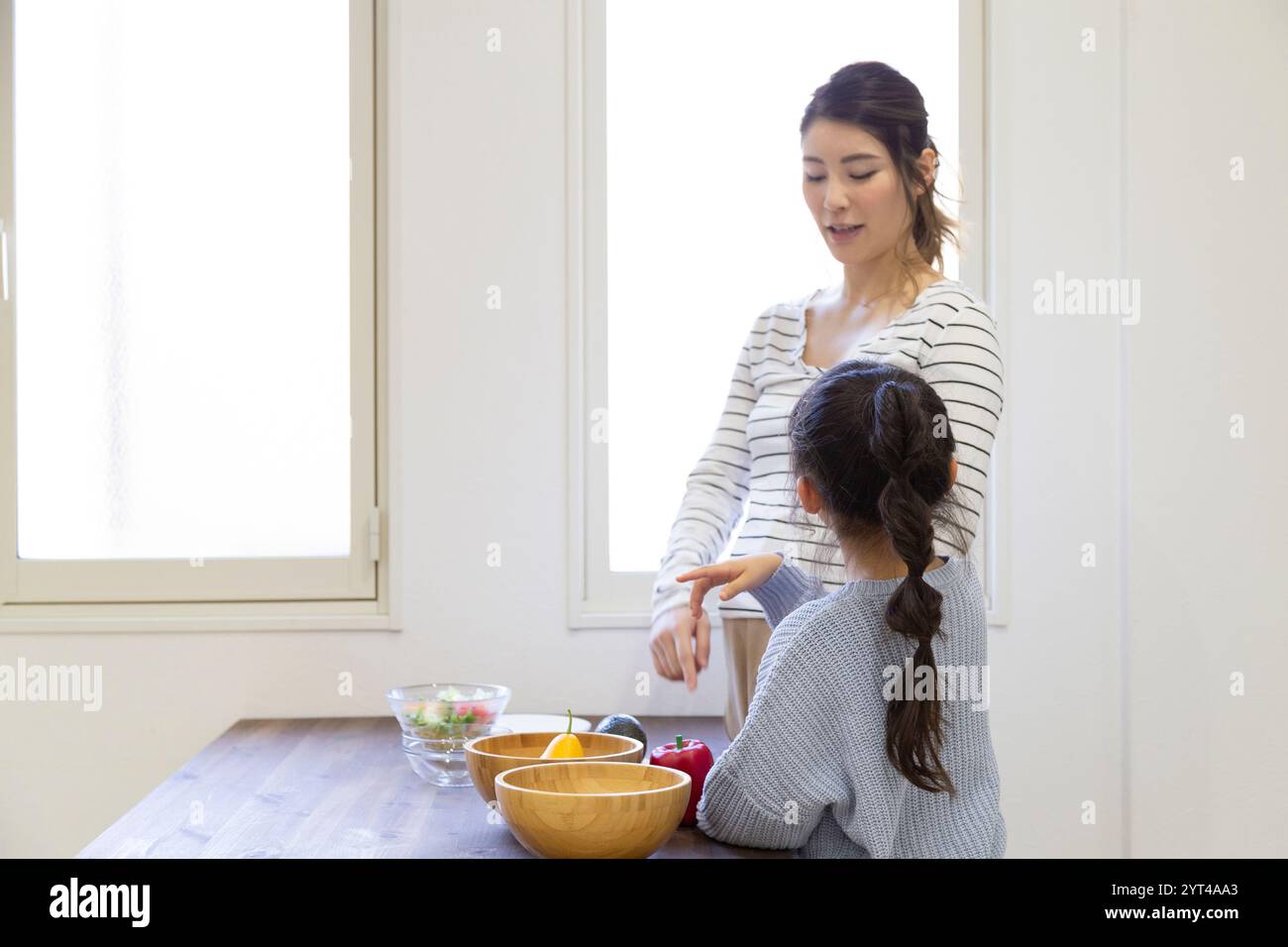 Parent and child cooking Stock Photo - Alamy
