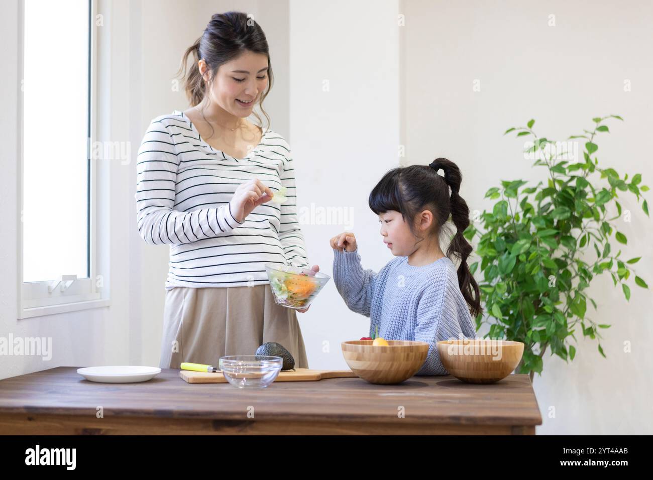 Parent and child cooking Stock Photo - Alamy