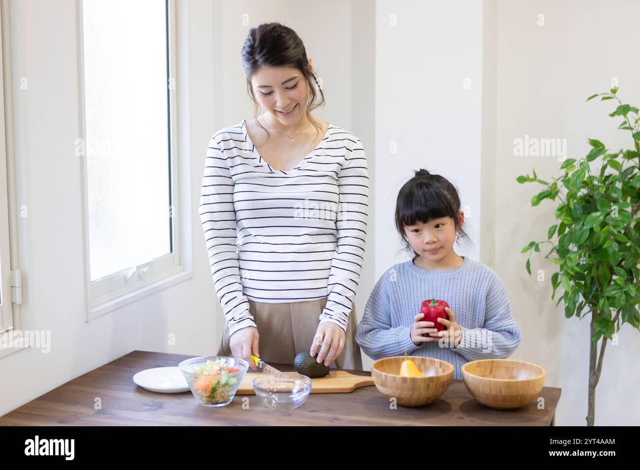 Parent and child cooking Stock Photo - Alamy