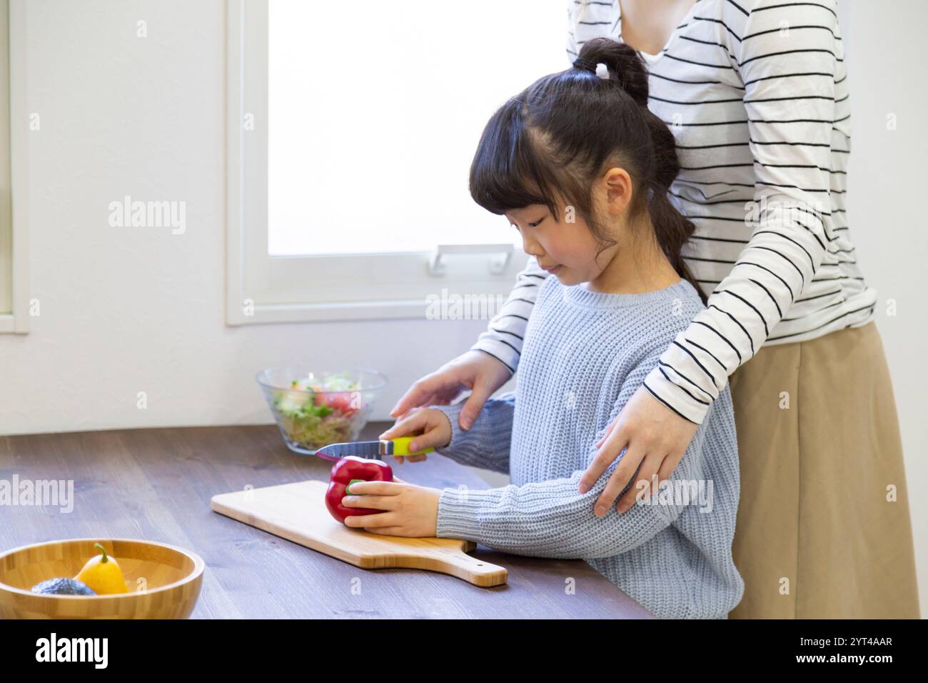 Parent and child cooking Stock Photo - Alamy