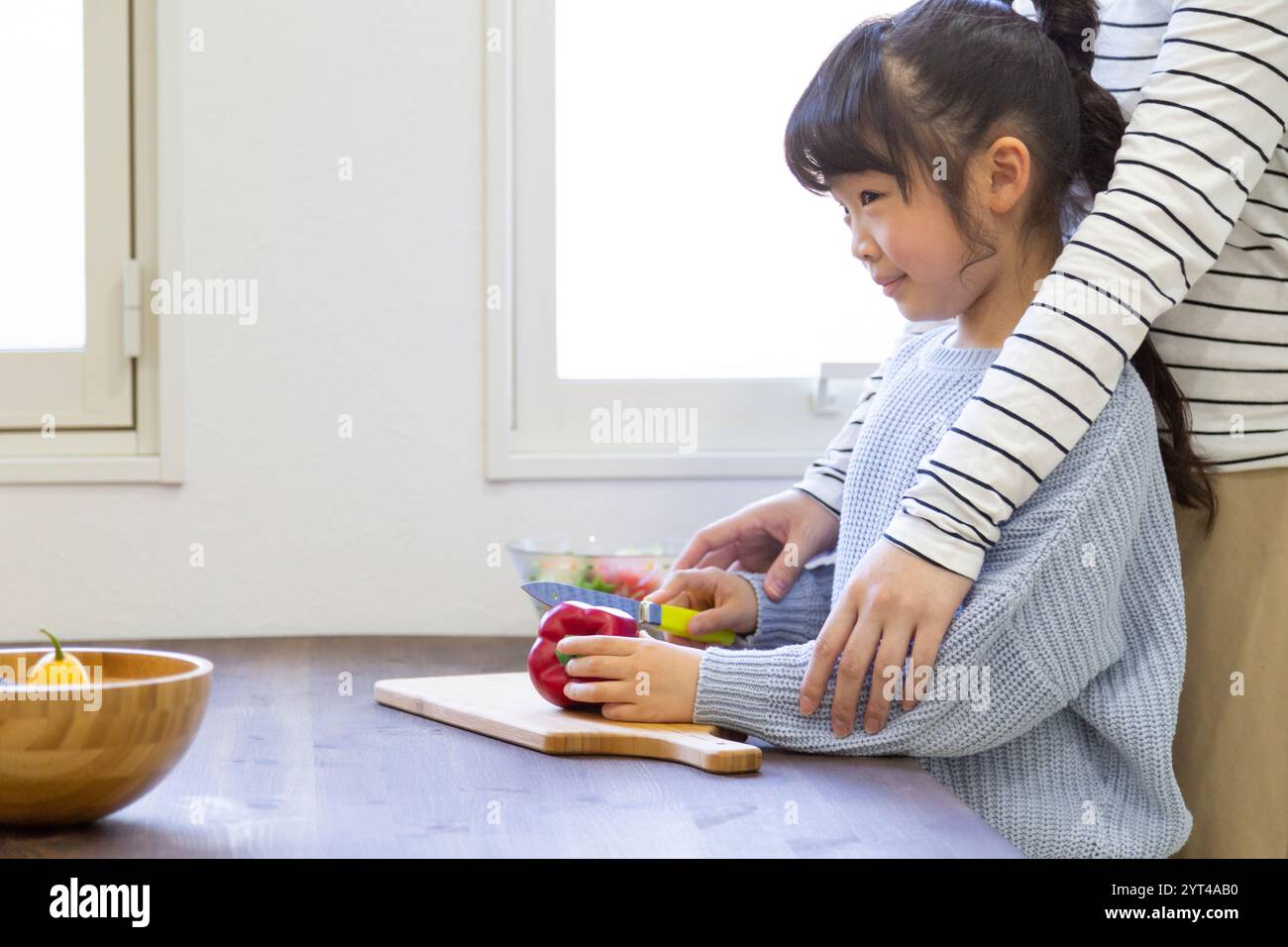 Parent and child cooking Stock Photo - Alamy