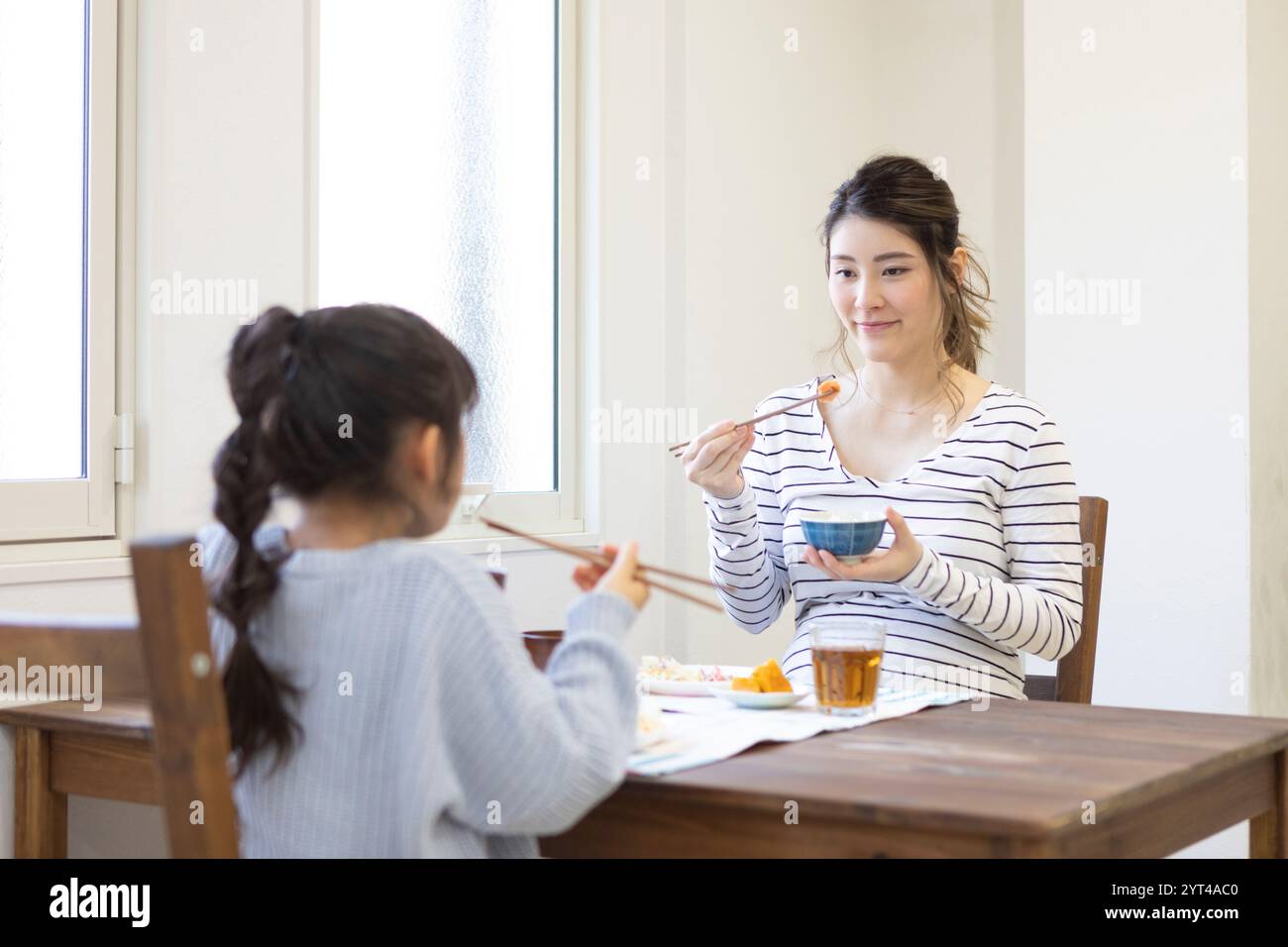 Cute child mother eating hi-res stock photography and images - Alamy