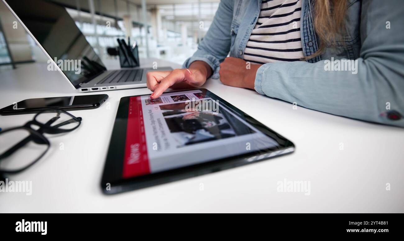 Watching News On Screen. Reading Newspaper Website On Laptop Stock ...