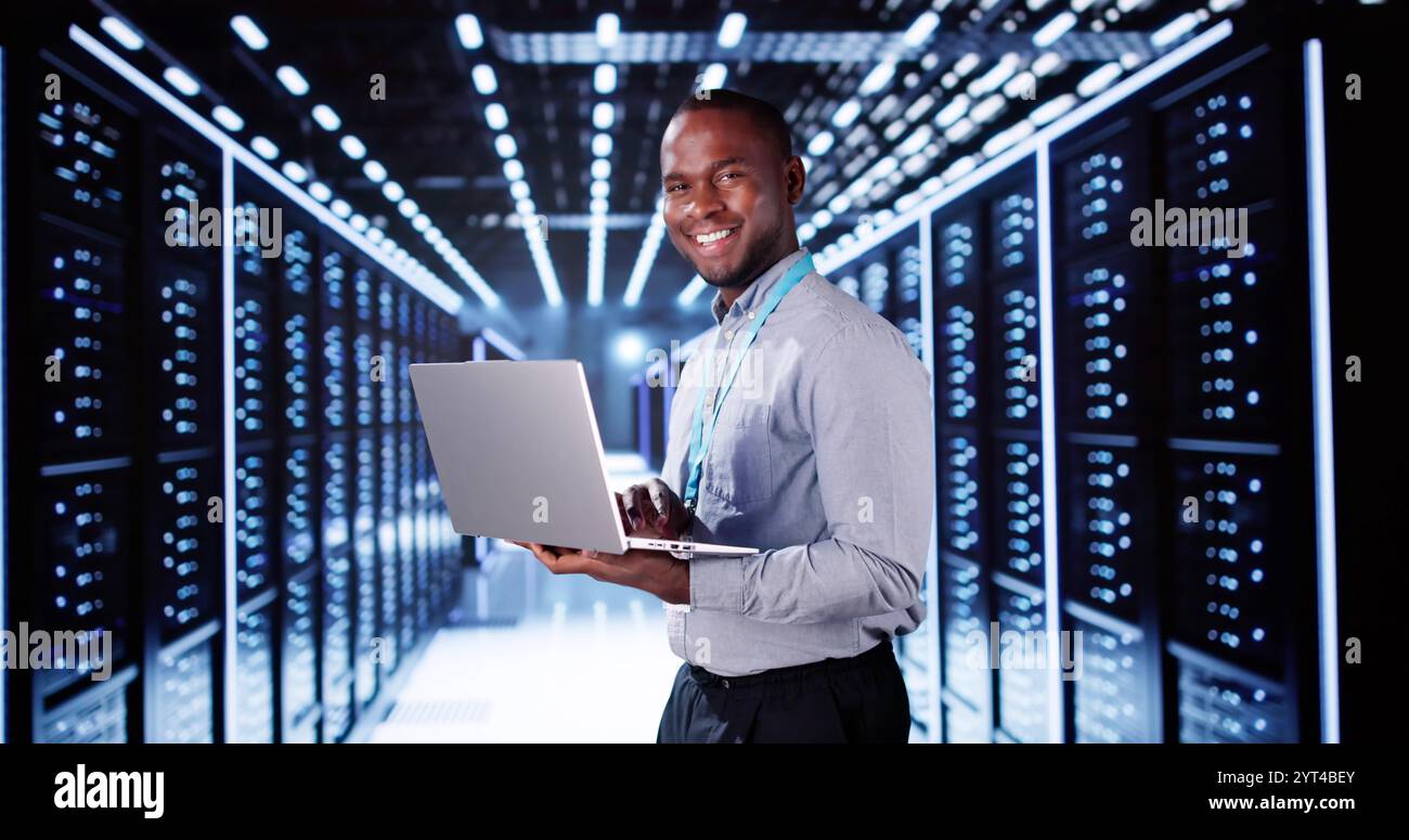 Happy Engineer In Data Center Server Room Configuring AI Technology Stock Photo - Alamy