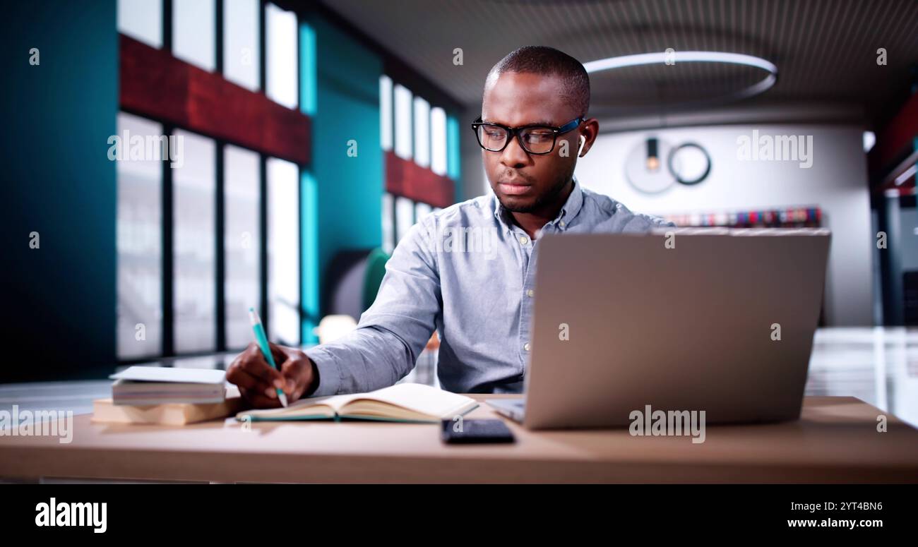 Black student doing research hi-res stock photography and images - Alamy