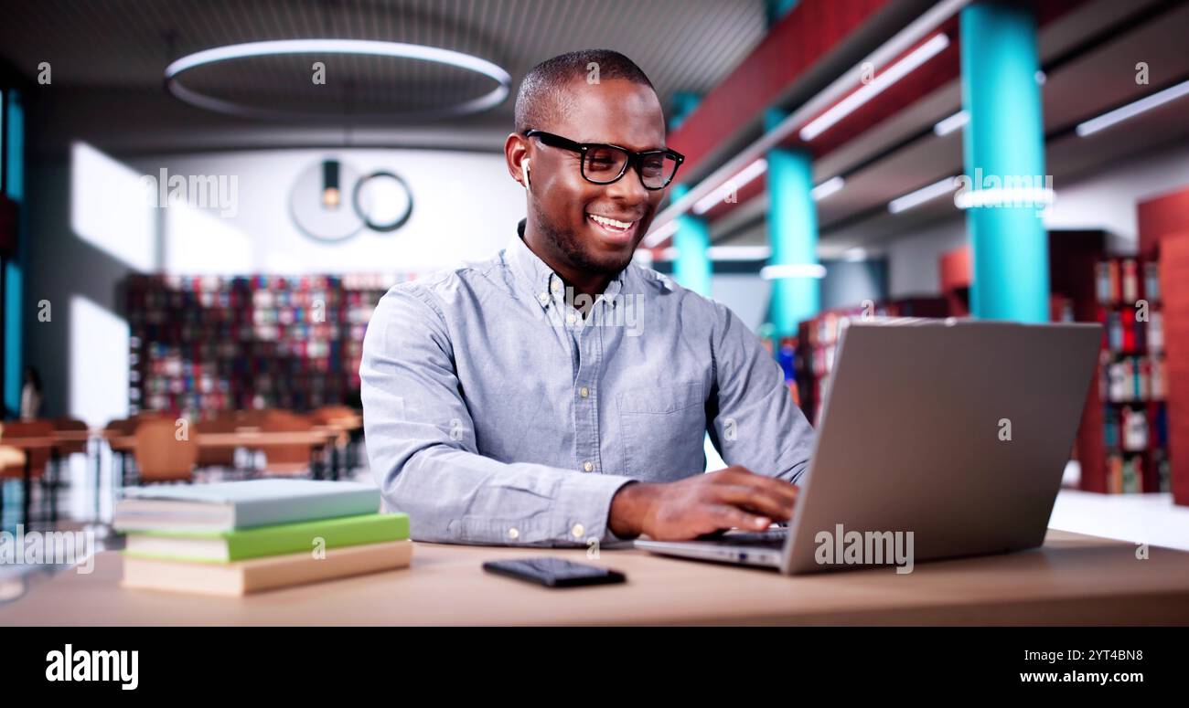 Black student doing research hi-res stock photography and images - Alamy
