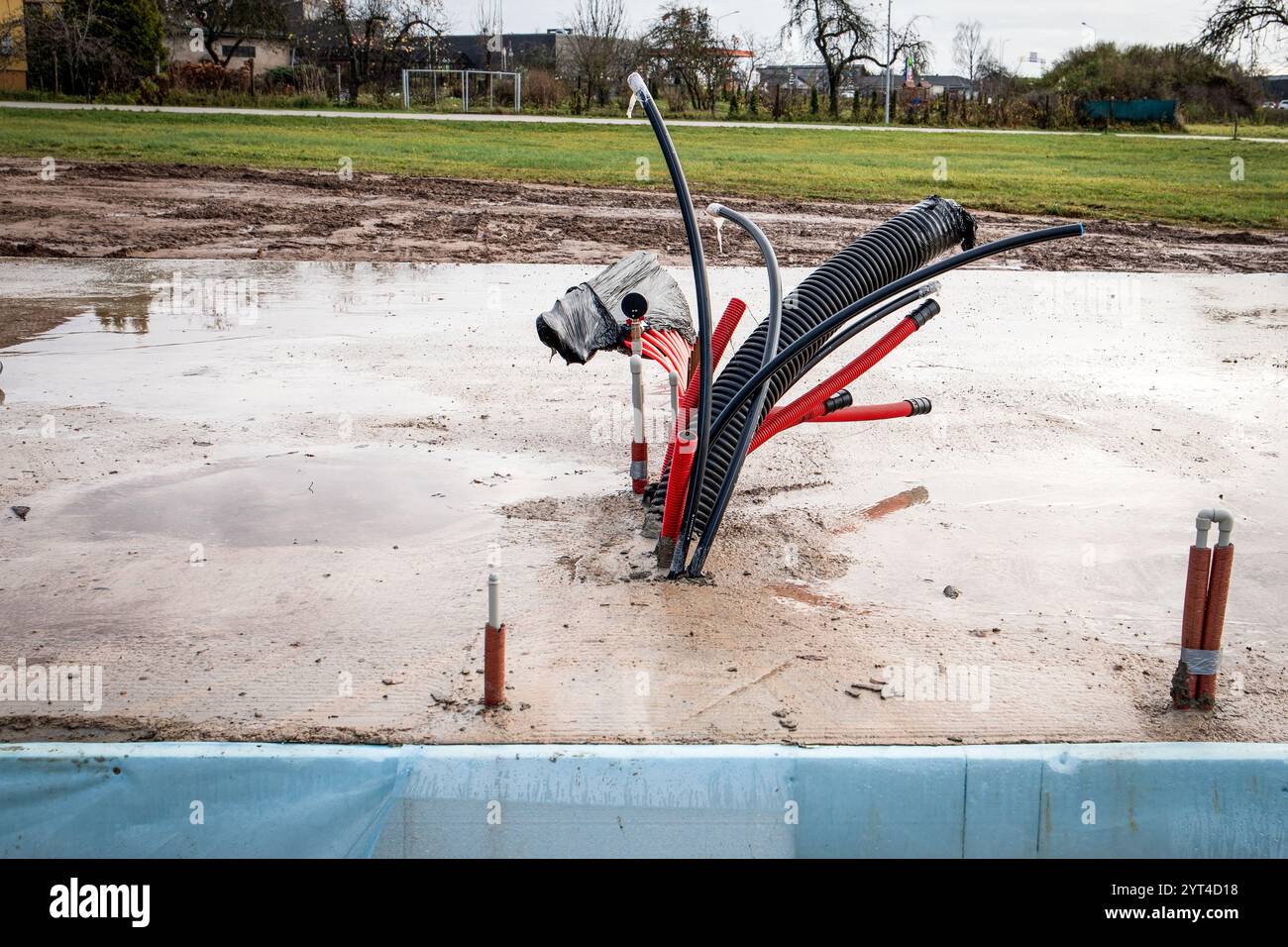 Insulated building foundation slab and communications. Pipes for water ...