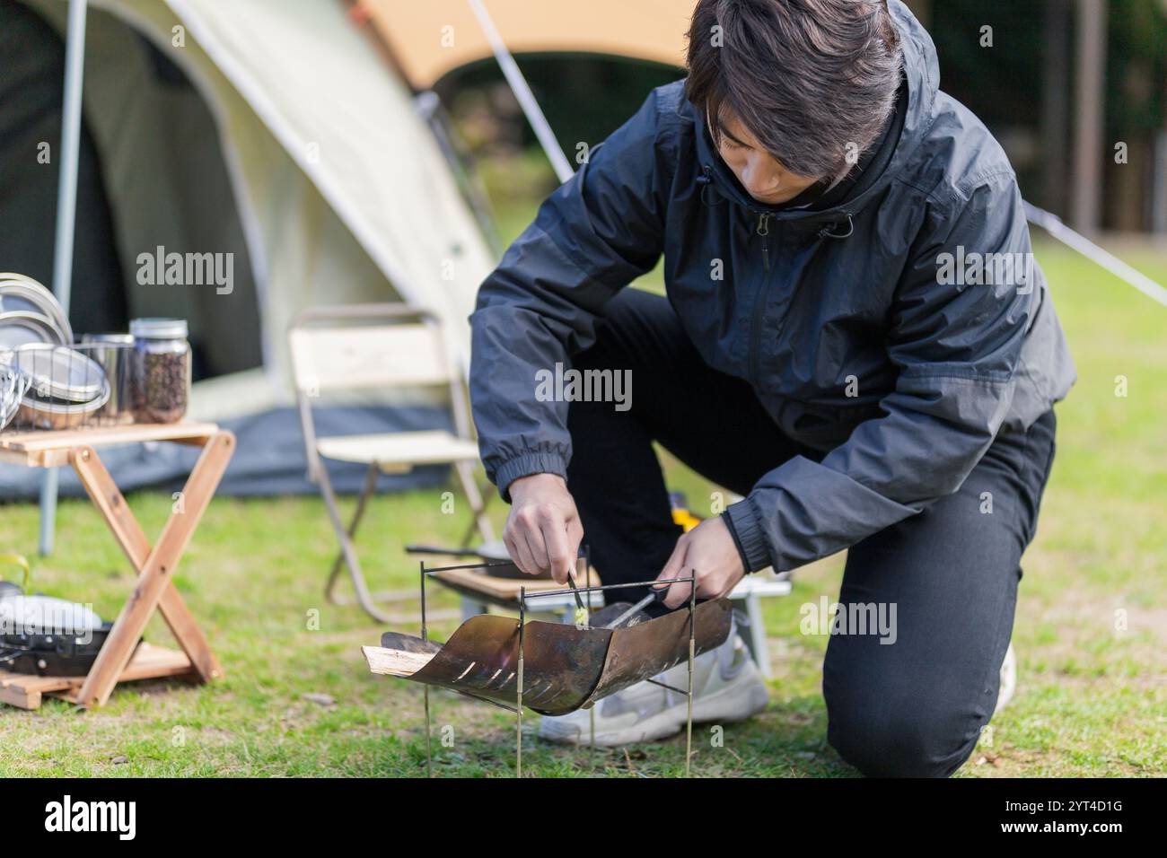 Man making firewood hi-res stock photography and images - Alamy