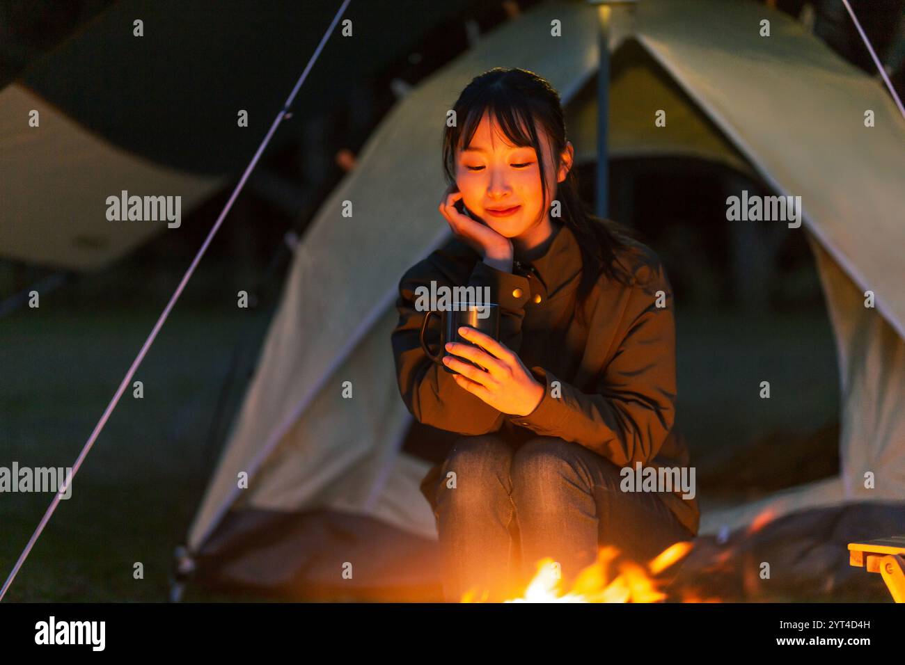 Women with bonfire Stock Photo - Alamy