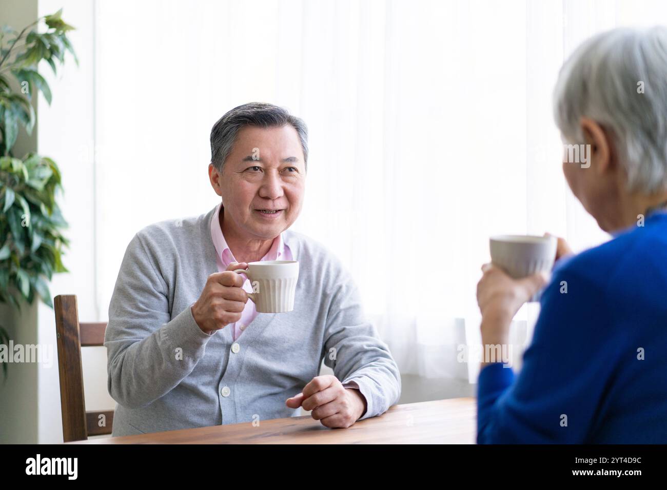 Senior woman having conversation hi-res stock photography and images ...