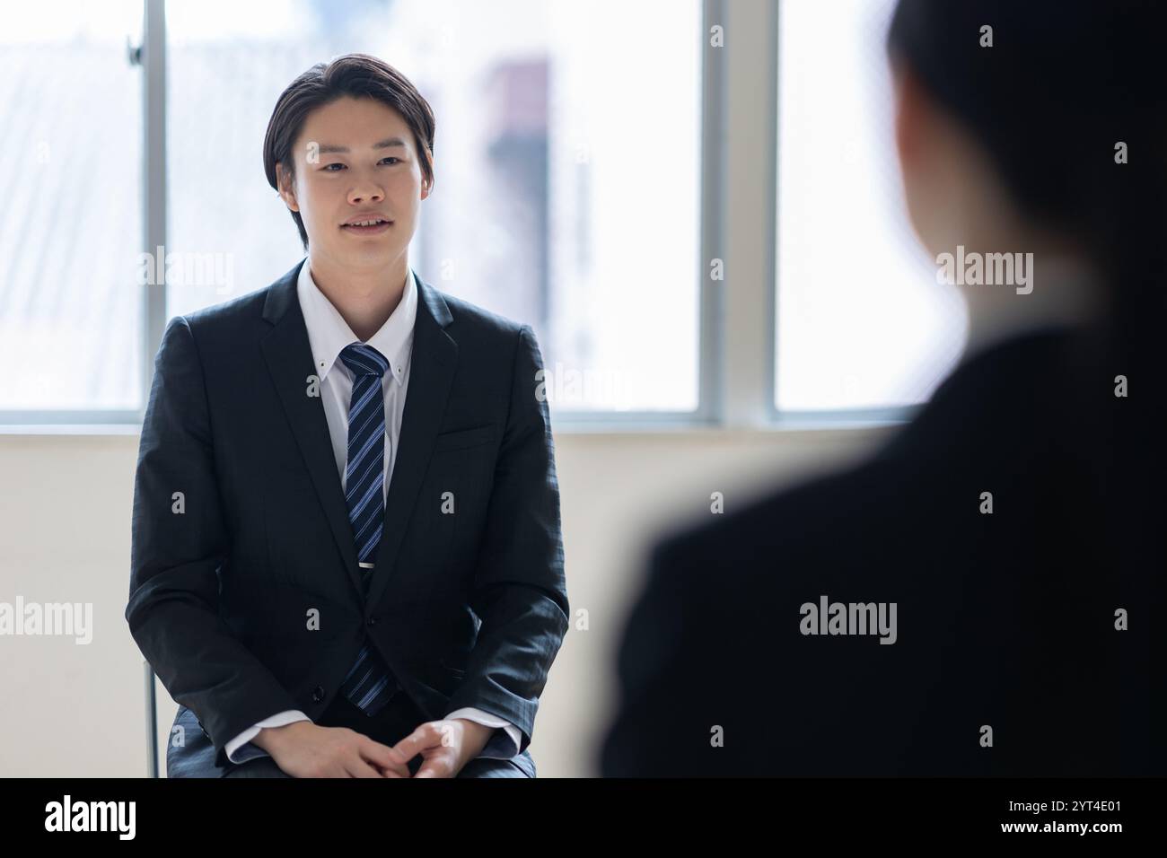 Man being interviewed Stock Photo - Alamy
