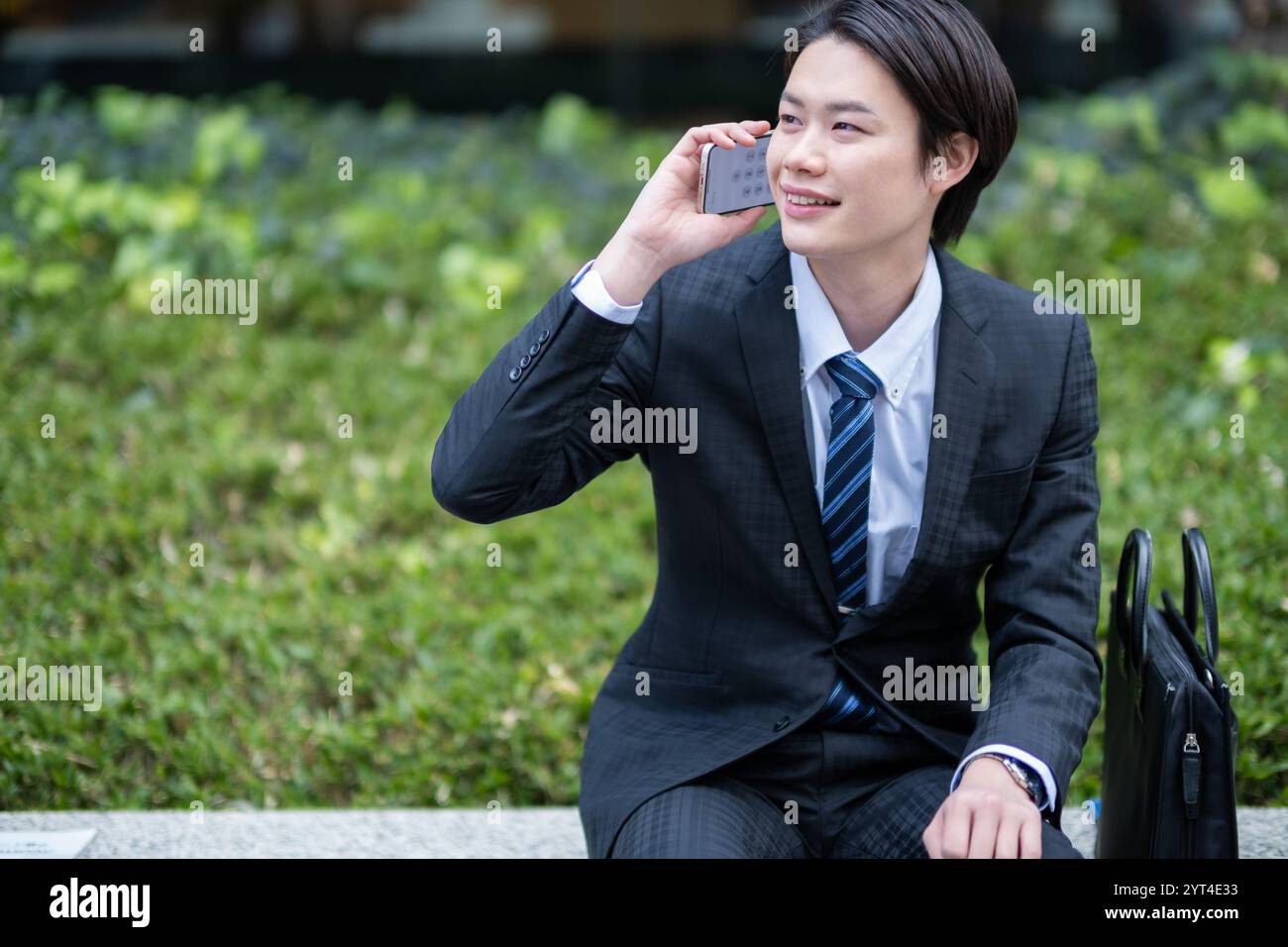Businessman making phone call outdoors hi-res stock photography and ...