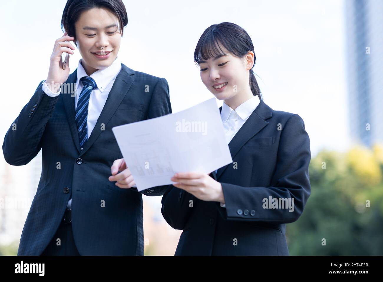 Businessmen checking documents Stock Photo - Alamy