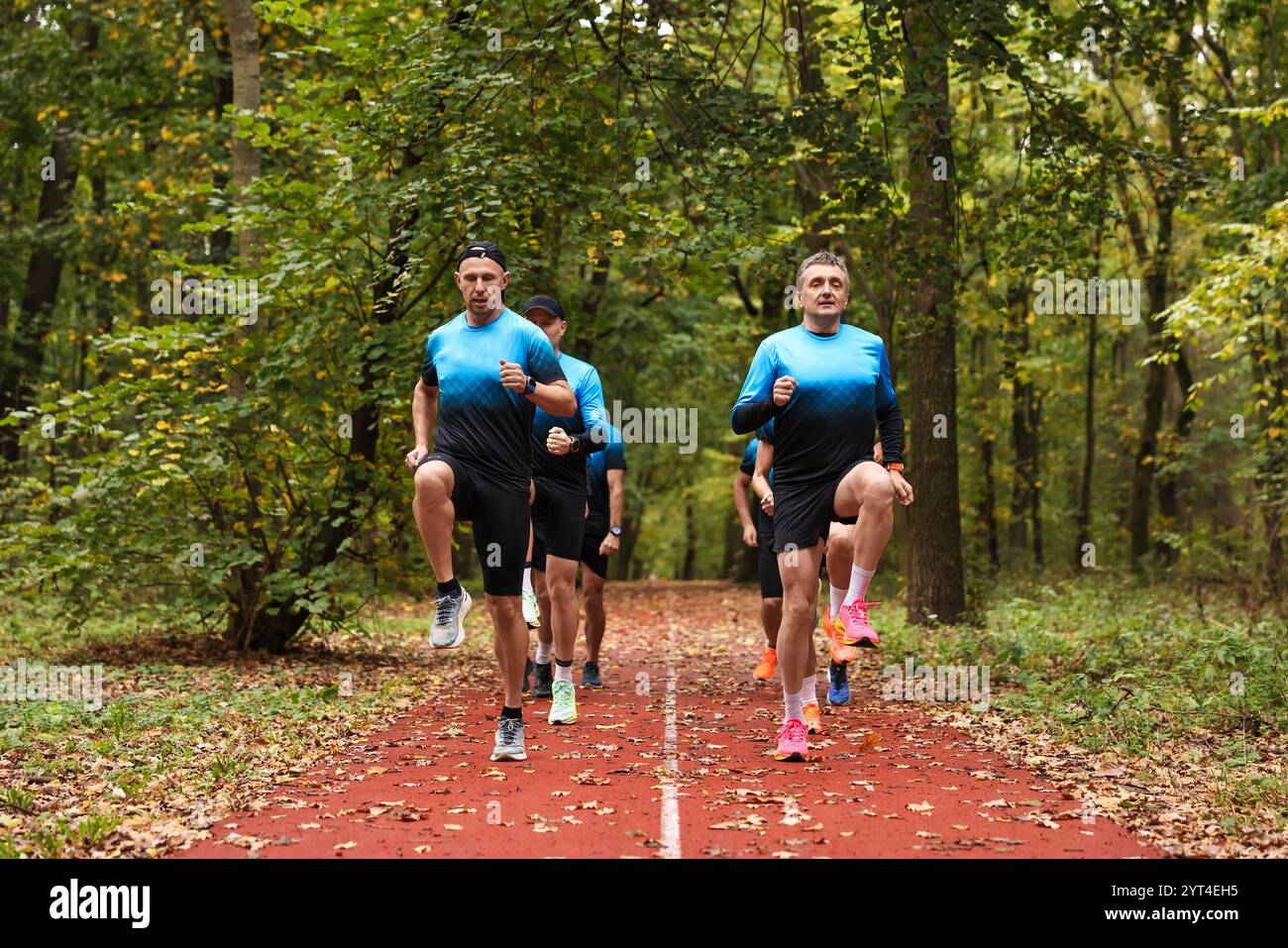 Athletic group running park hi-res stock photography and images - Alamy