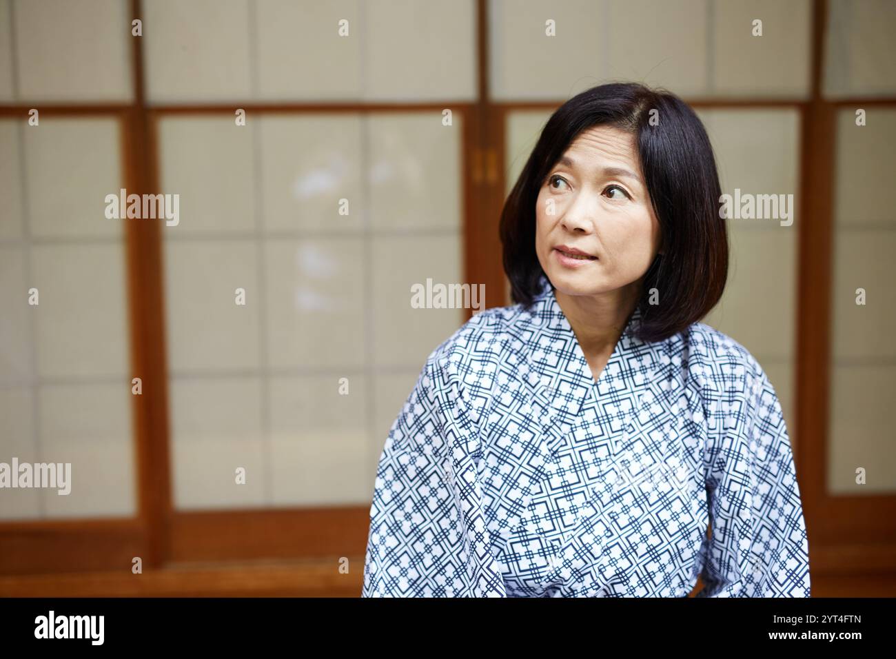 Woman relaxing in an inn Stock Photo - Alamy