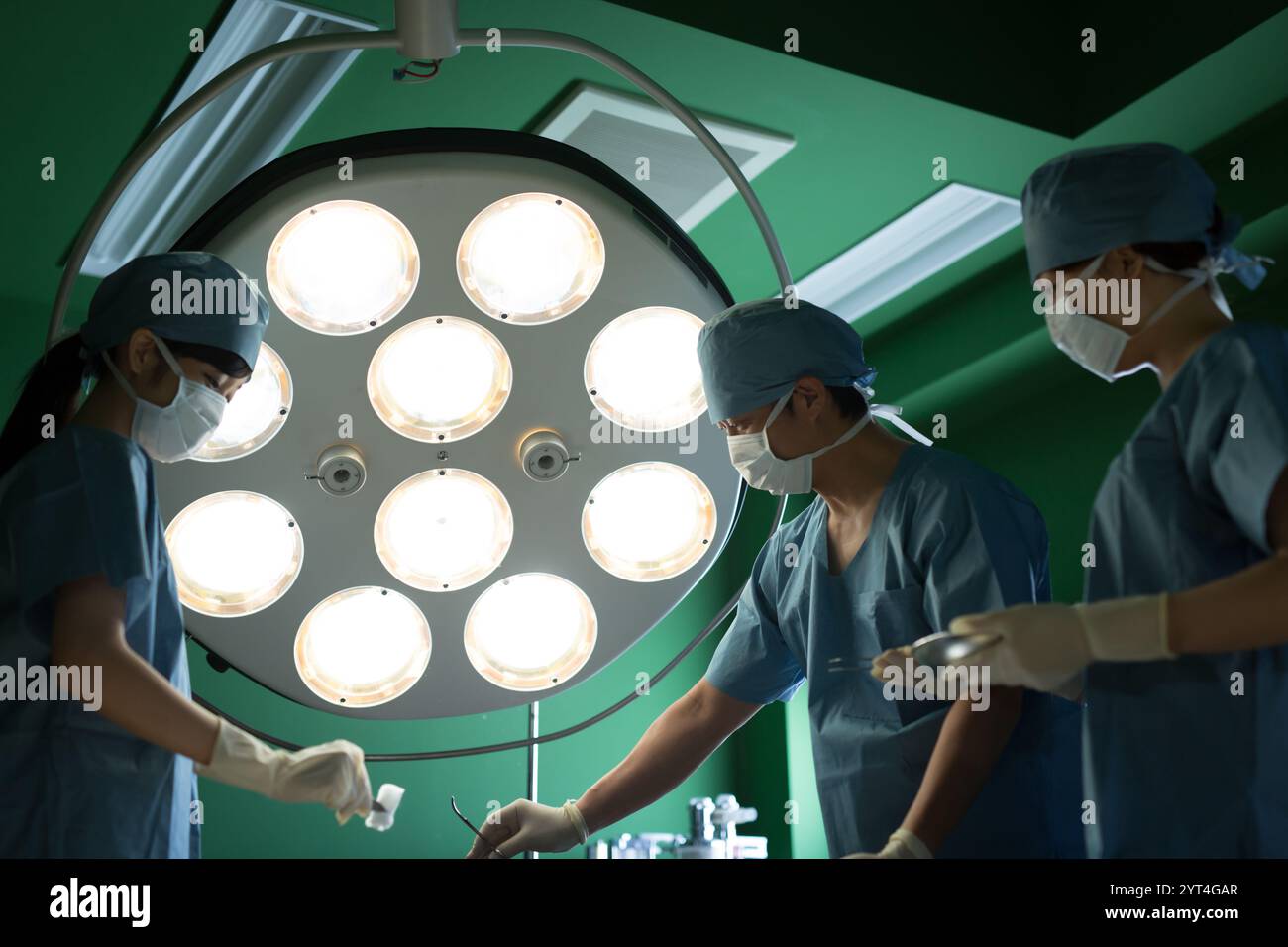 Medical staff during surgery Stock Photo - Alamy