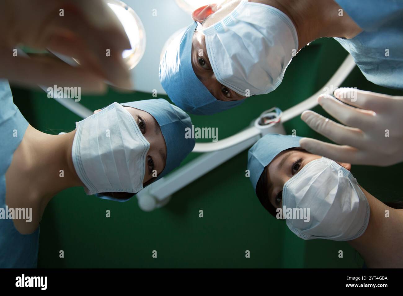 Medical staff during surgery Stock Photo - Alamy