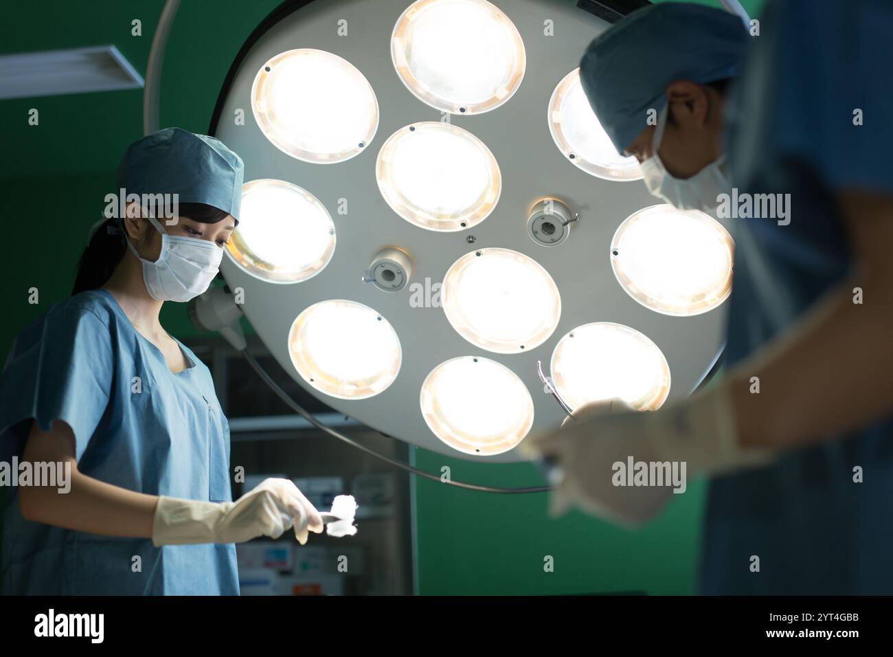 Medical staff during surgery Stock Photo - Alamy