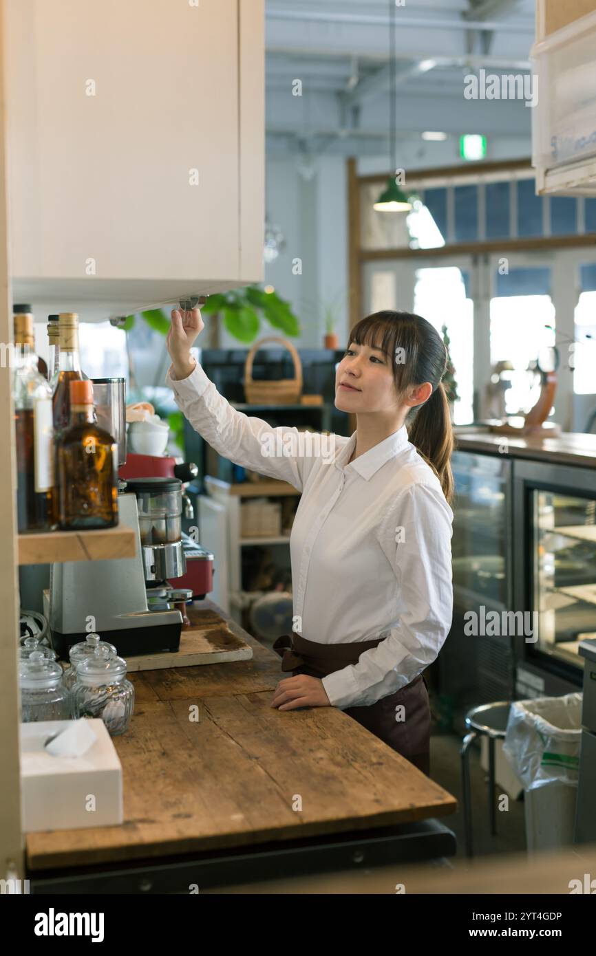 Female employee working hi-res stock photography and images - Alamy