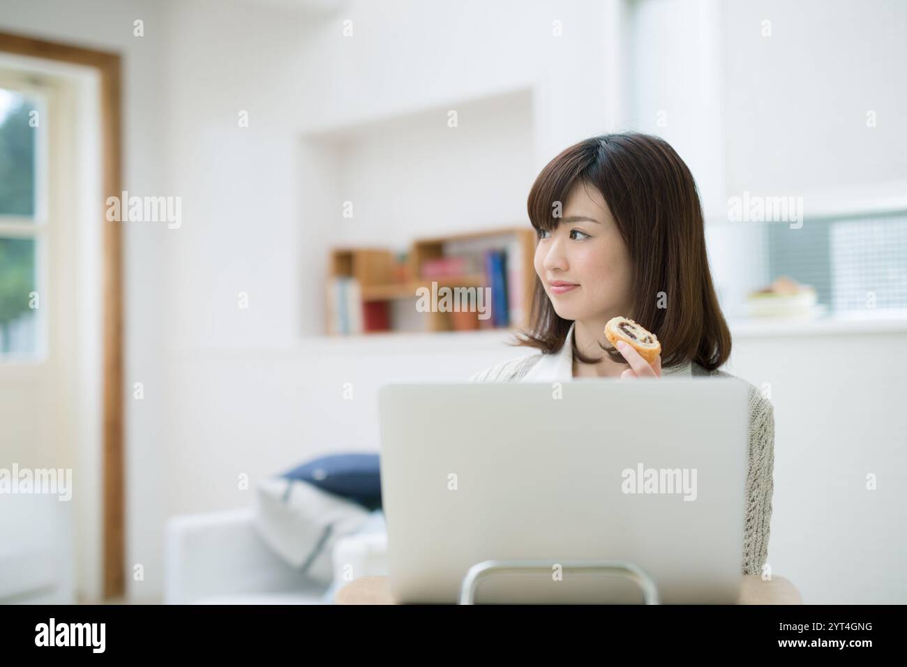Women using computer in room Stock Photo - Alamy