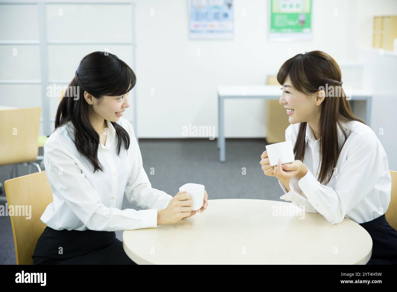 Office workers during break Stock Photo - Alamy