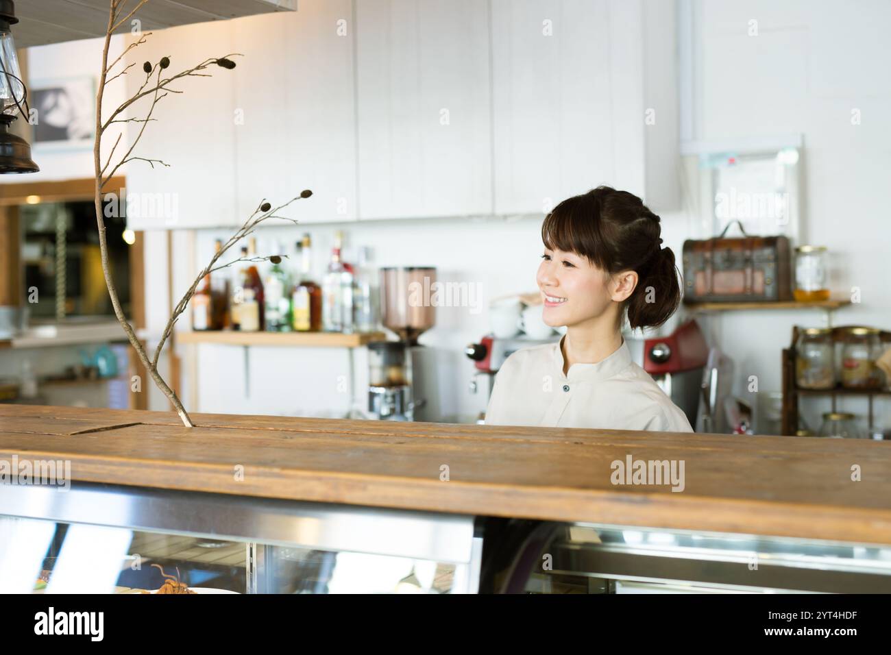 Staff working in a café Stock Photo - Alamy