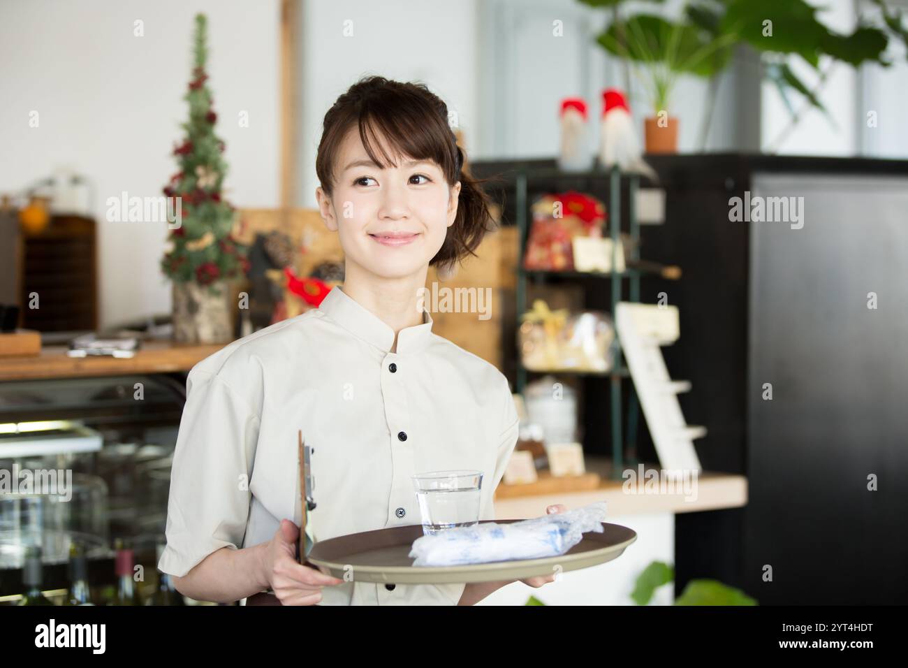 Staff working in a café Stock Photo - Alamy