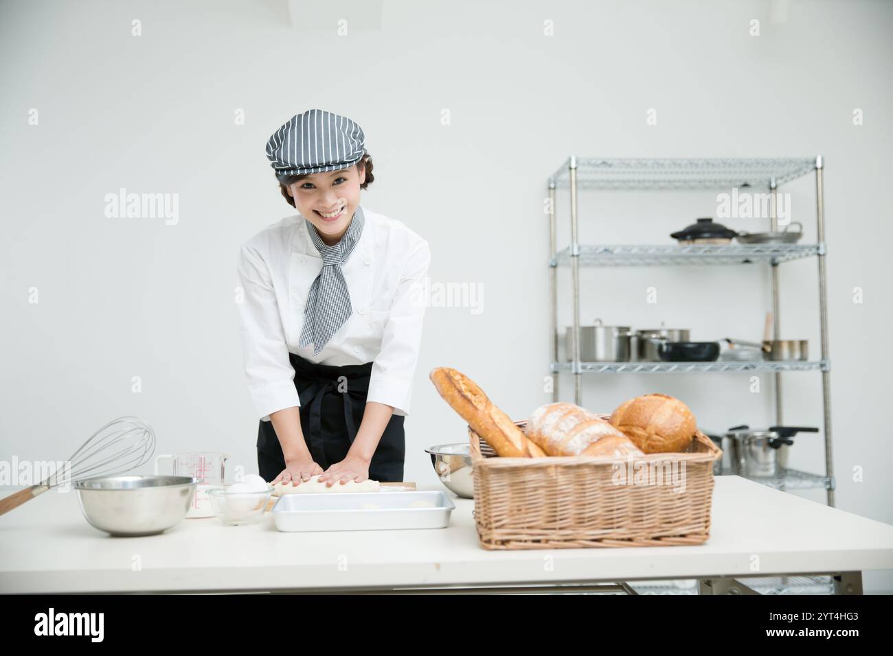 Baker making bread Stock Photo - Alamy